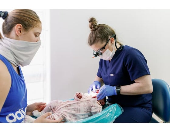 Working on baby patient at North Texas Smiles Pediatric Dentistry ...