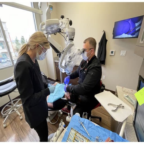 Jeff Allred DDS working on patient at Allred Dental | PDF