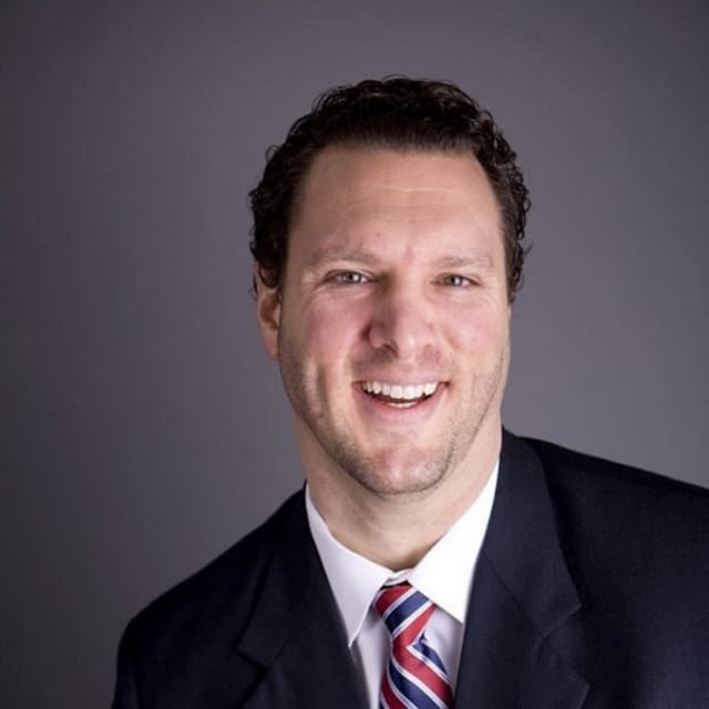 Dr. Jordan Moffitt at work at Moffitt Dental Center | PDF