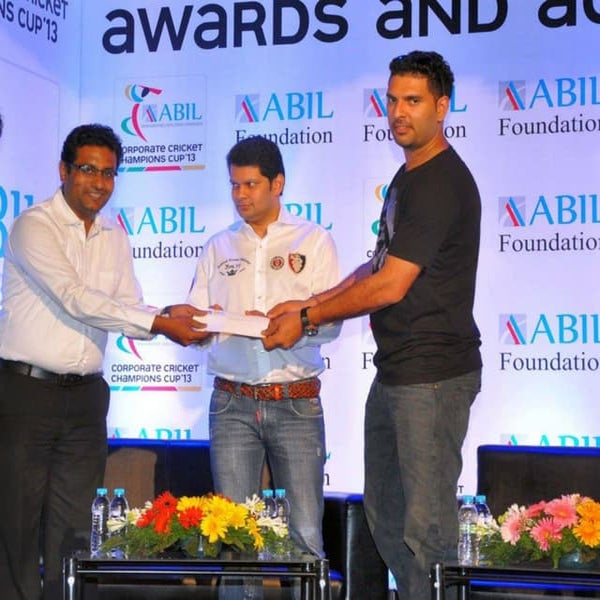 Amit Bhosale of ABIL Group with Cricketer Yuraj Singh | PDF