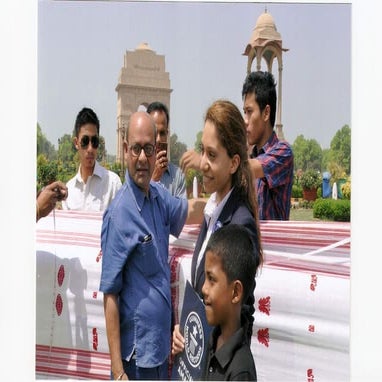 Interaction with an official from Guinness World Record performing a ...