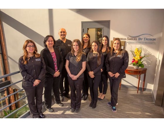 Warm and friendly front desk staff at Fairfield Smiles by Design | PPT